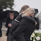 Sad, hug and a father and child at a grave for a funeral and mourning ...