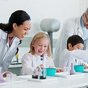 Chemistry, learning and teachers doing experiment with children for a ...