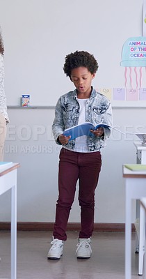 Education, answer and students and boy in classroom for learning ...