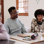 University students, talking and class with conversation, collaboration ...