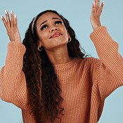 Confused, frustrated and young woman in studio with questions, thinking ...