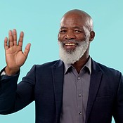 Business man, wave hello and studio with face, smile and kindness for ...