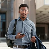 Man, walking and texting from work, corporate clothes and wondering in ...