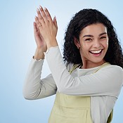 Woman, face and applause in studio for success, praise and ...