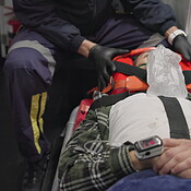 Patient, paramedic and man with oxygen mask in ambulance for emergency ...