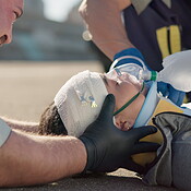 Hands, emergency healthcare and a paramedic team with a patient or ...