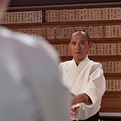 Student in dojo with sensei, bow and aikido training with fitness ...