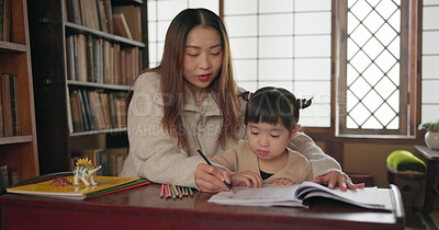 Japanese Mom, child and education with homework, writing and books for ...