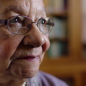 Senior, thinking and sad woman with mental health, dementia and alzheimers at home. Elderly ...