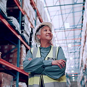 Senior woman, arms crossed and warehouse for logistics, shipping ...