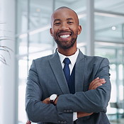 Portrait, professional and black man with smile in office, employee and ...