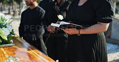 Funeral, man and woman hug at graveyard for memorial service at burial ...