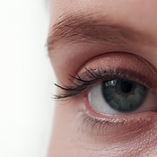 Blinking, half and eye for health of vision, closeup and sight for ...