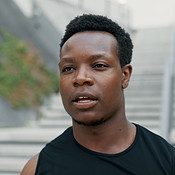 Running, fitness and tired black man with city steps challenge, workout ...