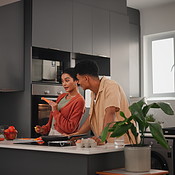 Cooking, live streaming and couple in kitchen with camera for vlogging ...