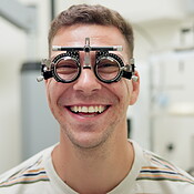 Trial, frame and man for optometry vision with eye exam, consultation ...