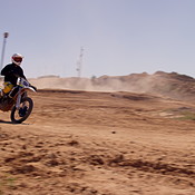 Motorcycle, outdoor and man riding on off road for competition or race ...