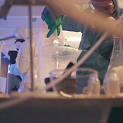 Chemical, laboratory and PPE suit for science in engineering in ...