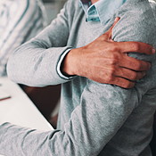 Businessman, arm pain and injury with strain in stress, joint ache or ...