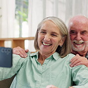 Senior couple, people and home on couch for selfie with smile for ...