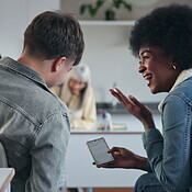Student, classroom and talking with smartphone in lesson, disruptive ...