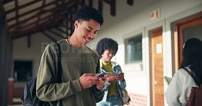 Boy, texting and happy on smartphone in high school, communication and ...