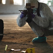 Forensic photographer, crime scene and person with evidence for ...