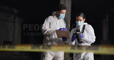 Crime scene, forensic man and woman in discussion with evidence, ppe ...