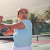 Sports, tennis and woman on court stretching for competition ...