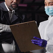 Forensic, detective and evidence with discussion at crime scene for ...