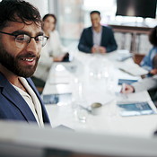 Presentation, boardroom and man with smile, talking and ai to analyze ...