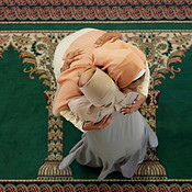 Women, hug and faith in islam at mosque, kindness and top view of ...