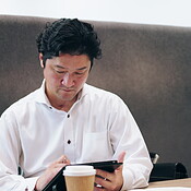Japanese, business and man with tablet in office for finance report ...