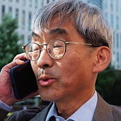 City, phone call and mature business man with glasses, conversation or ...