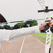 Archery, focus and woman with outdoor training, target practice and ...