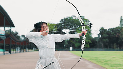 Shooting, aim and woman with archery training, target practice and ...