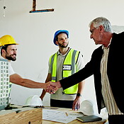 Greeting, architect and handshake for meeting, people and collaboration ...