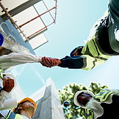 Engineers, meeting and handshake with welcome, inspection and planning ...