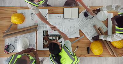 Team, people and construction with handshake, engineering and floor ...