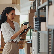 Shipping, inspector and woman with scanner, shelf and checking of ...