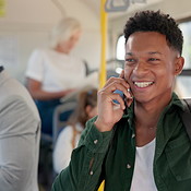 Man, student and phone with smile, bus and travel with backpack for ...