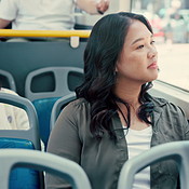 Bus, thinking and Asian woman by window for travel, journey and commute ...