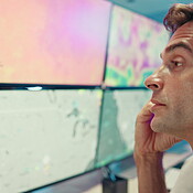 Computer, screen and tired man with ecology, office and broadcast for ...