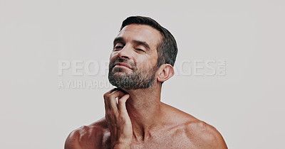 Beard, irritation or scratching and shirtless man in studio with ...