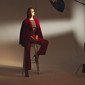 Photography, set and model on stool in studio with production team for ...