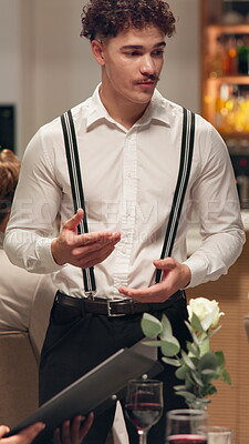 Waiter, menu and talking with man in restaurant for discussion, dinner ...