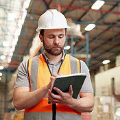 Logistics, check and man with tablet in warehouse for inspection ...
