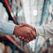Shaking hands, supply chain and people in warehouse for deal, agreement ...